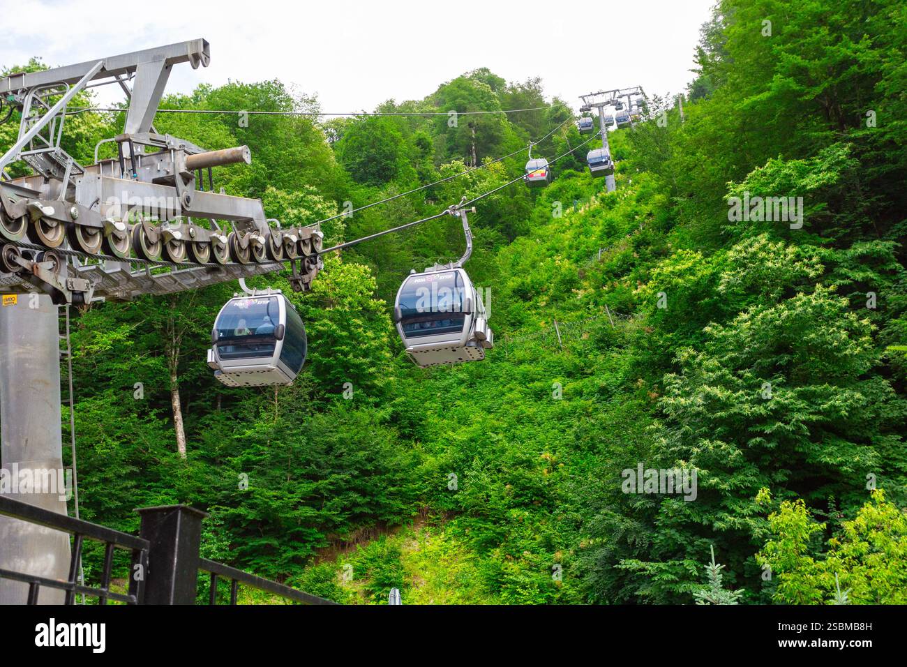 SOCHI, KRASNAYA POLYANA, RUSSIA - JUNE 23.2016: Cableway with ...