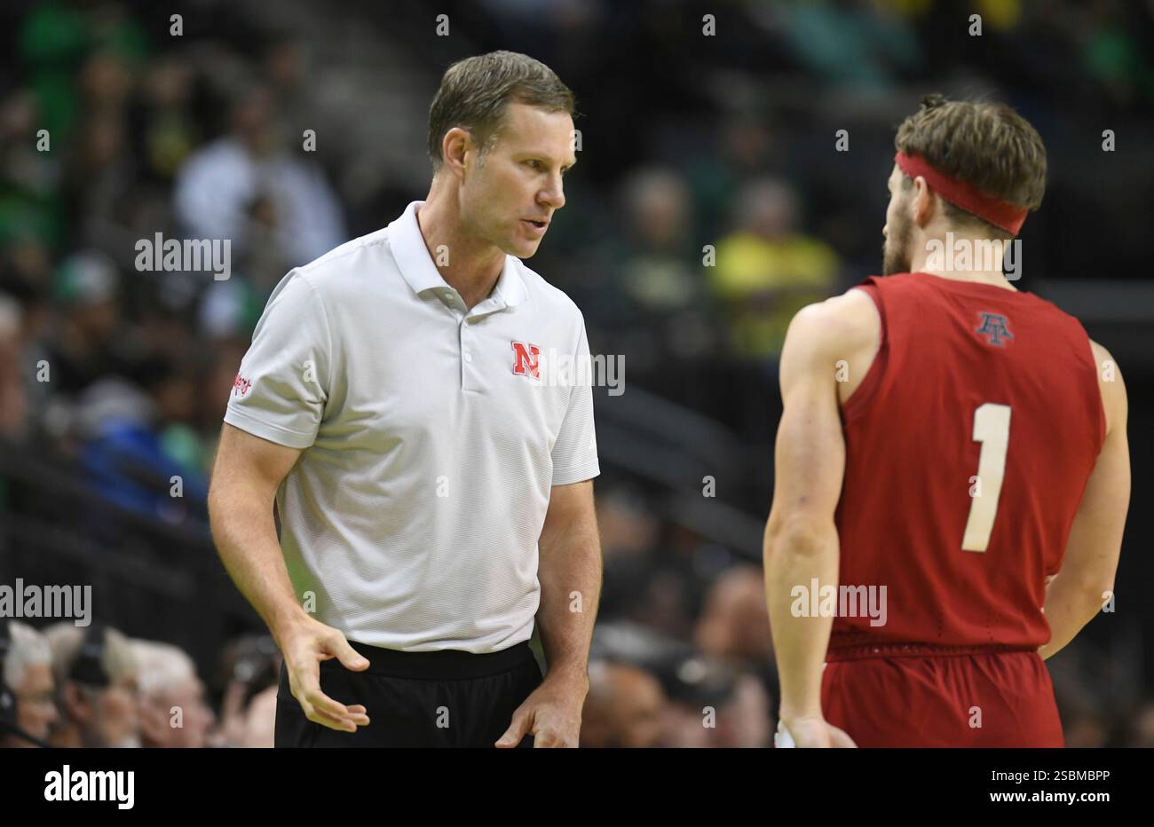 Nebraska head coach Fred Hoiberg talks with Nebraska guard Sam Hoiberg ...