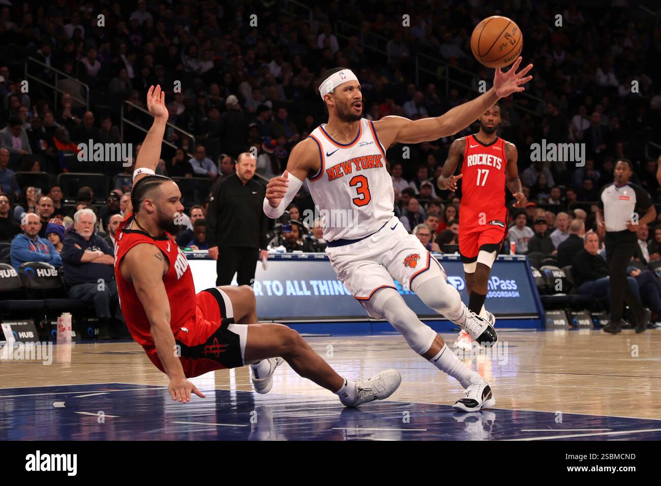New York Knicks' Josh Hart (3) knocks over Houston Rockets' Dillon ...