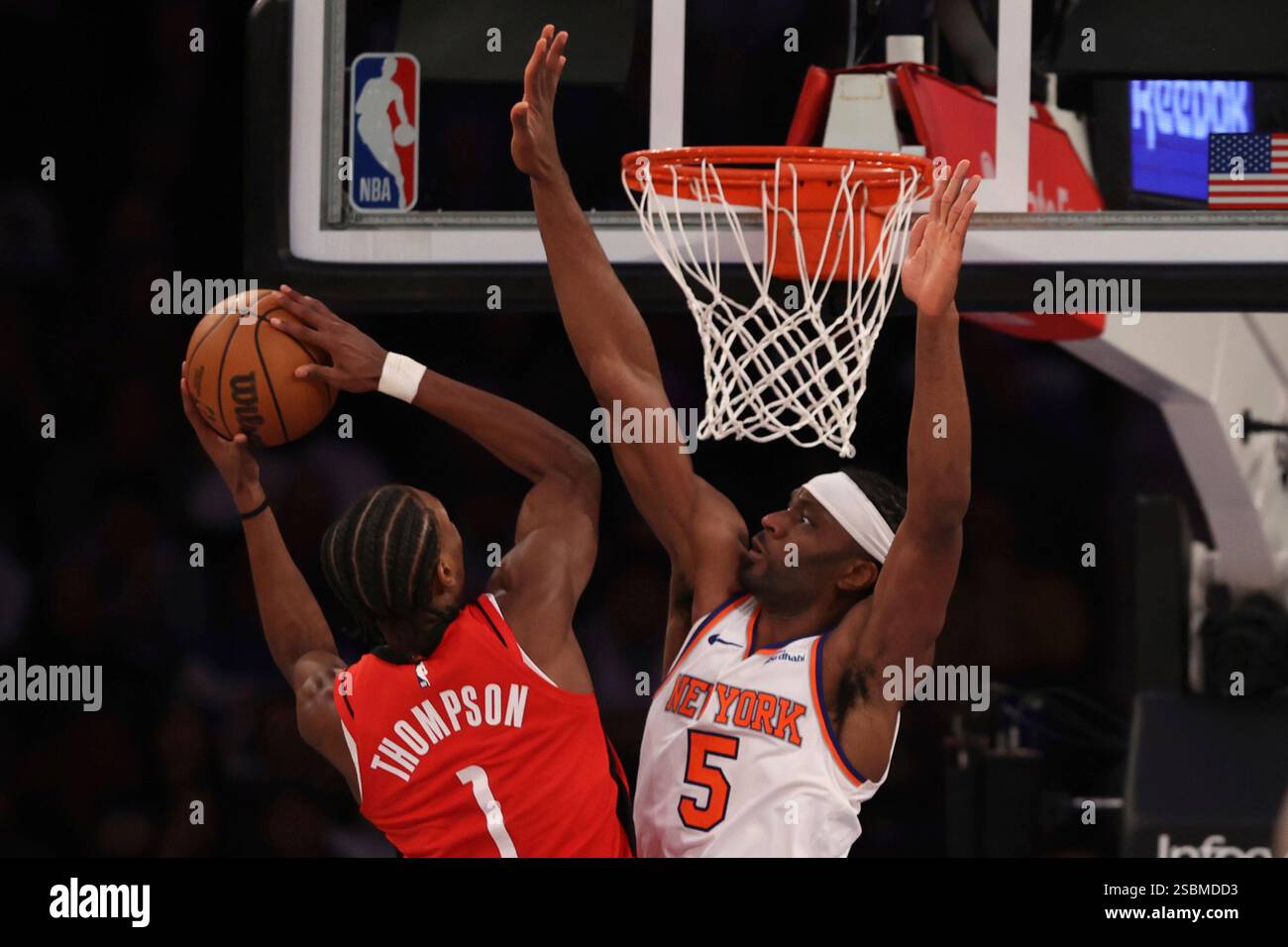 Houston Rockets Amen Thompson, left, shoots against New York Knicks ...