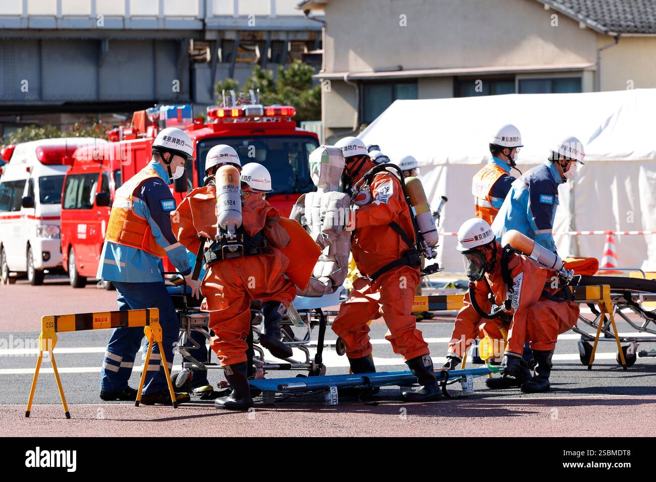 February 4, 2025, Tokyo, Japan: Firefighters wearing protective gears ...