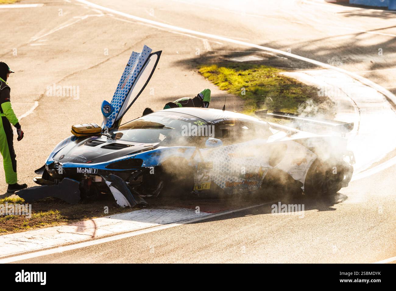 Bathurst, Australia. 02nd Feb, 2025. Track marshalls attend to The #25 ...