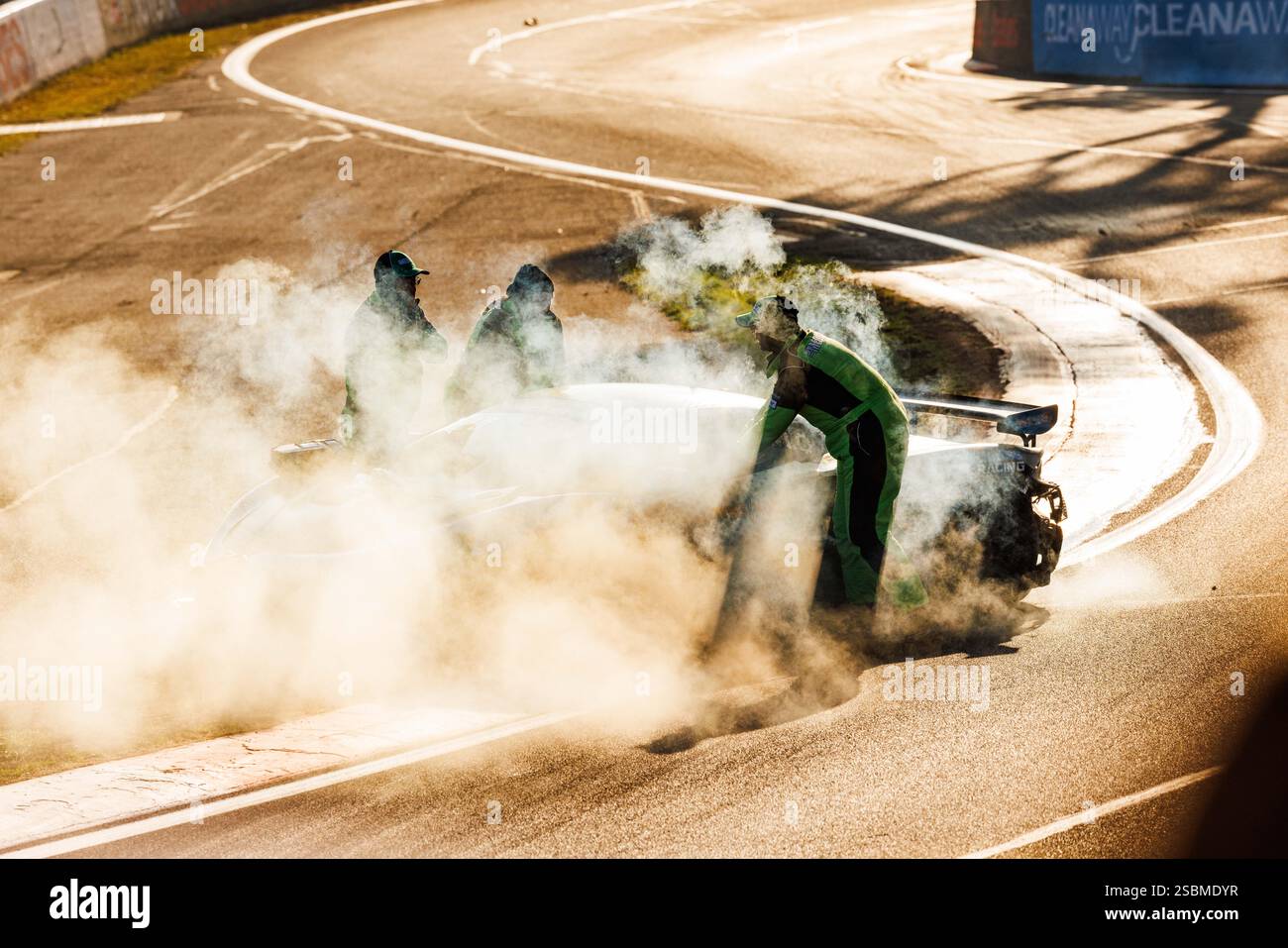 Bathurst, Australia. 02nd Feb, 2025. Track marshalls attend to The #25 ...