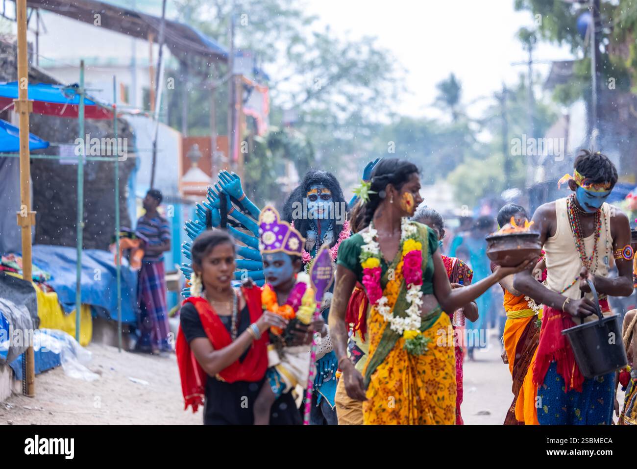 Kulasai, Portrait of indian hindu devotee with painted face and dressed ...