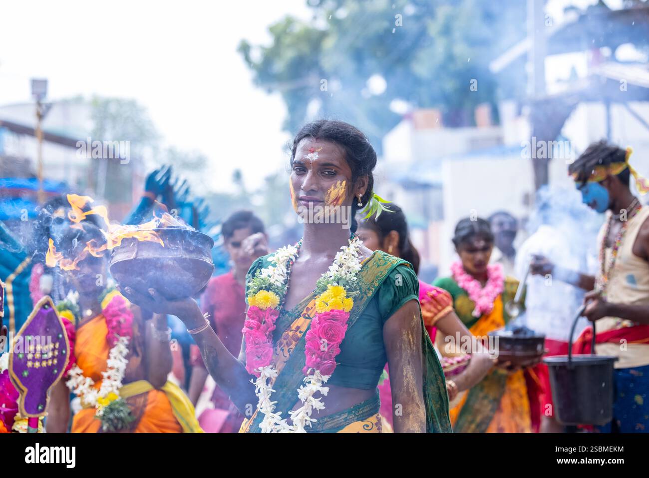 Kulasai, Portrait of indian hindu devotee with painted face and dressed ...