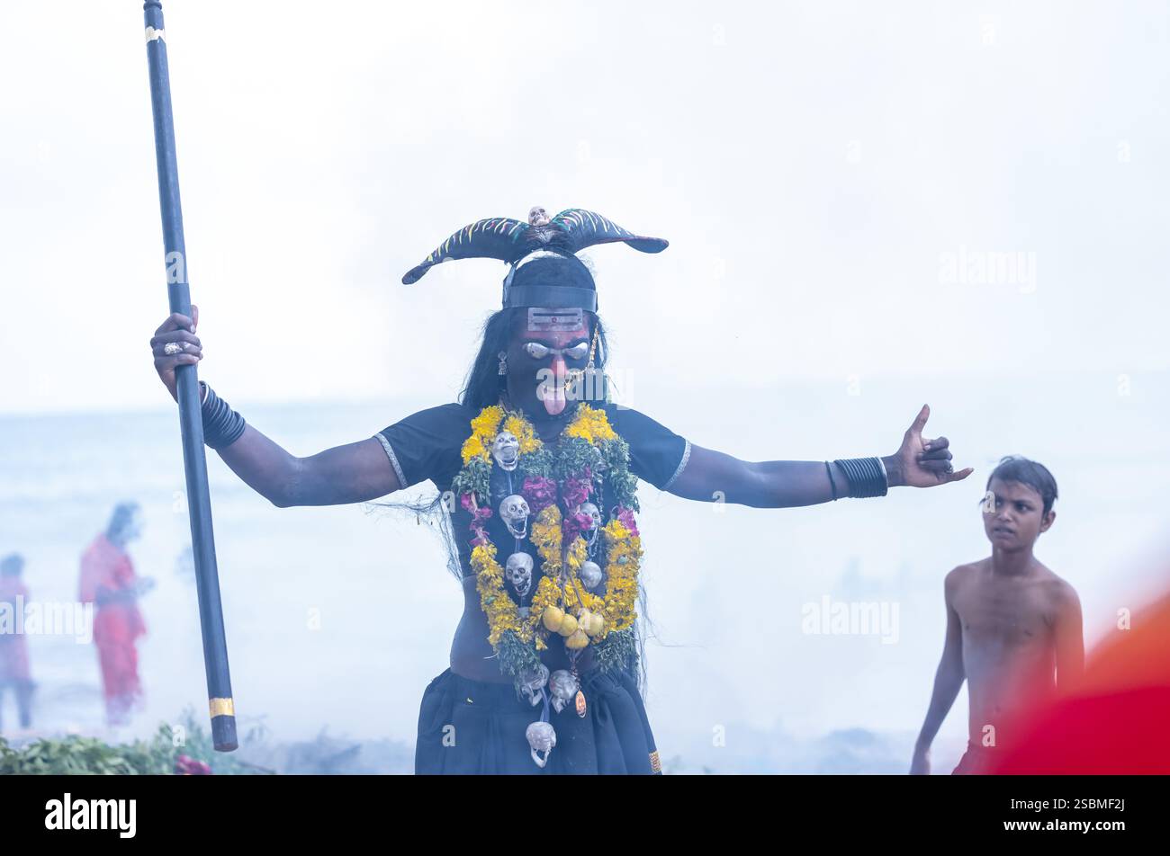 Kulasai, Portrait of indian hindu devotee with painted face and dressed ...