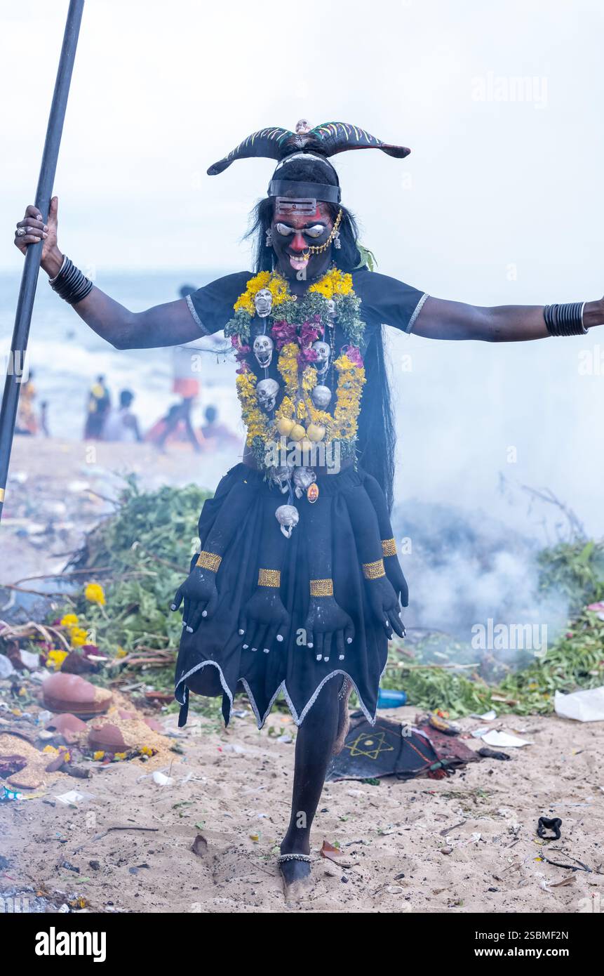 Kulasai, Portrait of indian hindu devotee with painted face and dressed ...