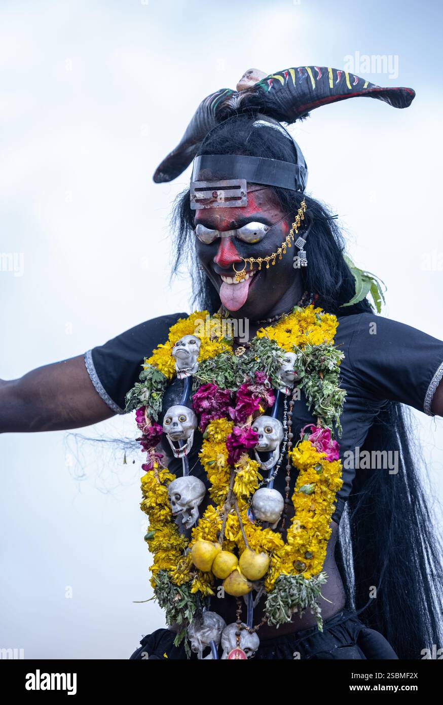 Kulasai, Portrait of indian hindu devotee with painted face and dressed ...