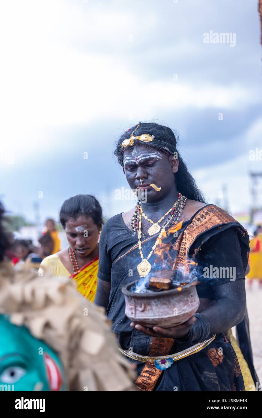 Kulasai, Portrait of indian hindu devotee with painted face and dressed ...