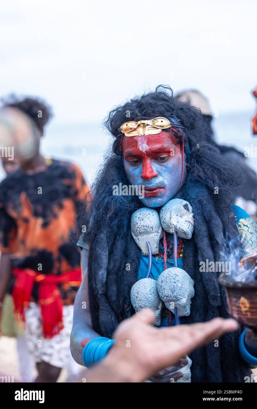 Kulasai, Portrait of indian hindu devotee with painted face and dressed ...