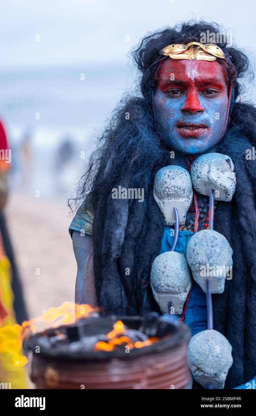 Kulasai, Portrait of indian hindu devotee with painted face and dressed ...