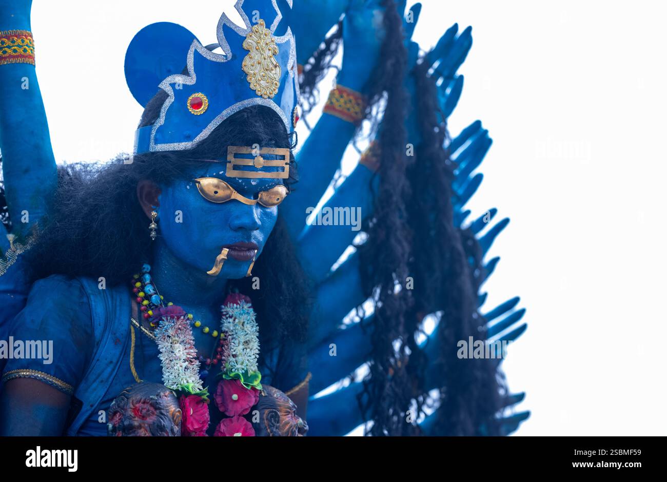 Kulasai, Portrait of indian hindu devotee with painted face and dressed ...
