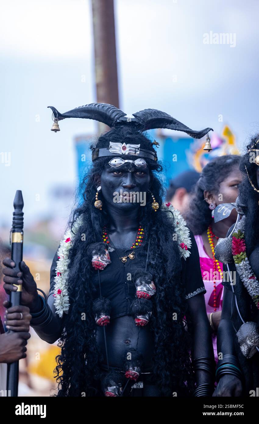 Kulasai, Portrait of indian hindu devotee with painted face and dressed ...