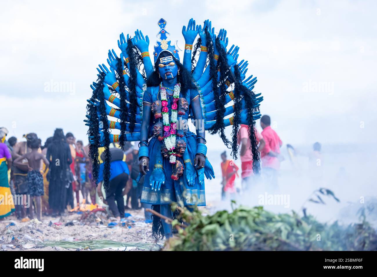 Kulasai, Portrait of indian hindu devotee with painted face and dressed ...