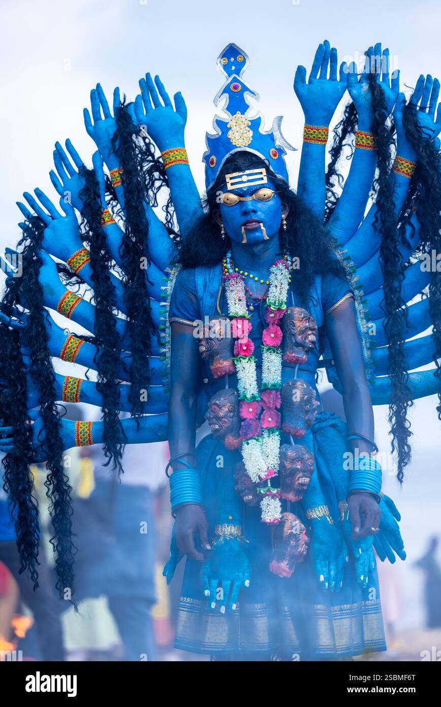 Kulasai, Portrait of indian hindu devotee with painted face and dressed ...