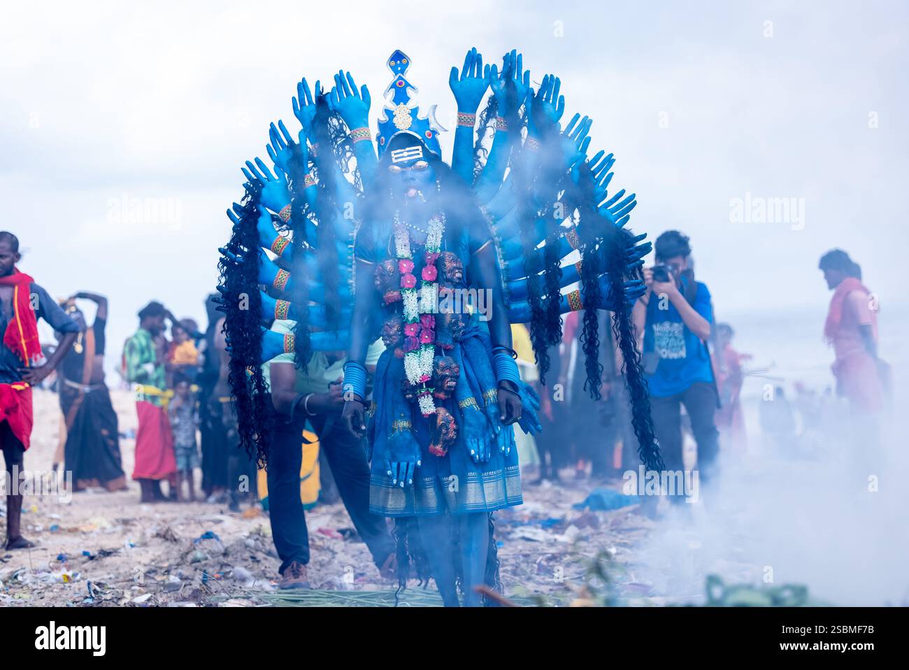 Kulasai, Portrait of indian hindu devotee with painted face and dressed ...