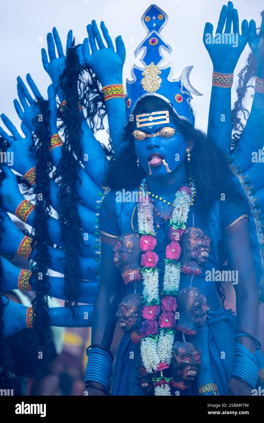 Kulasai, Portrait of indian hindu devotee with painted face and dressed ...