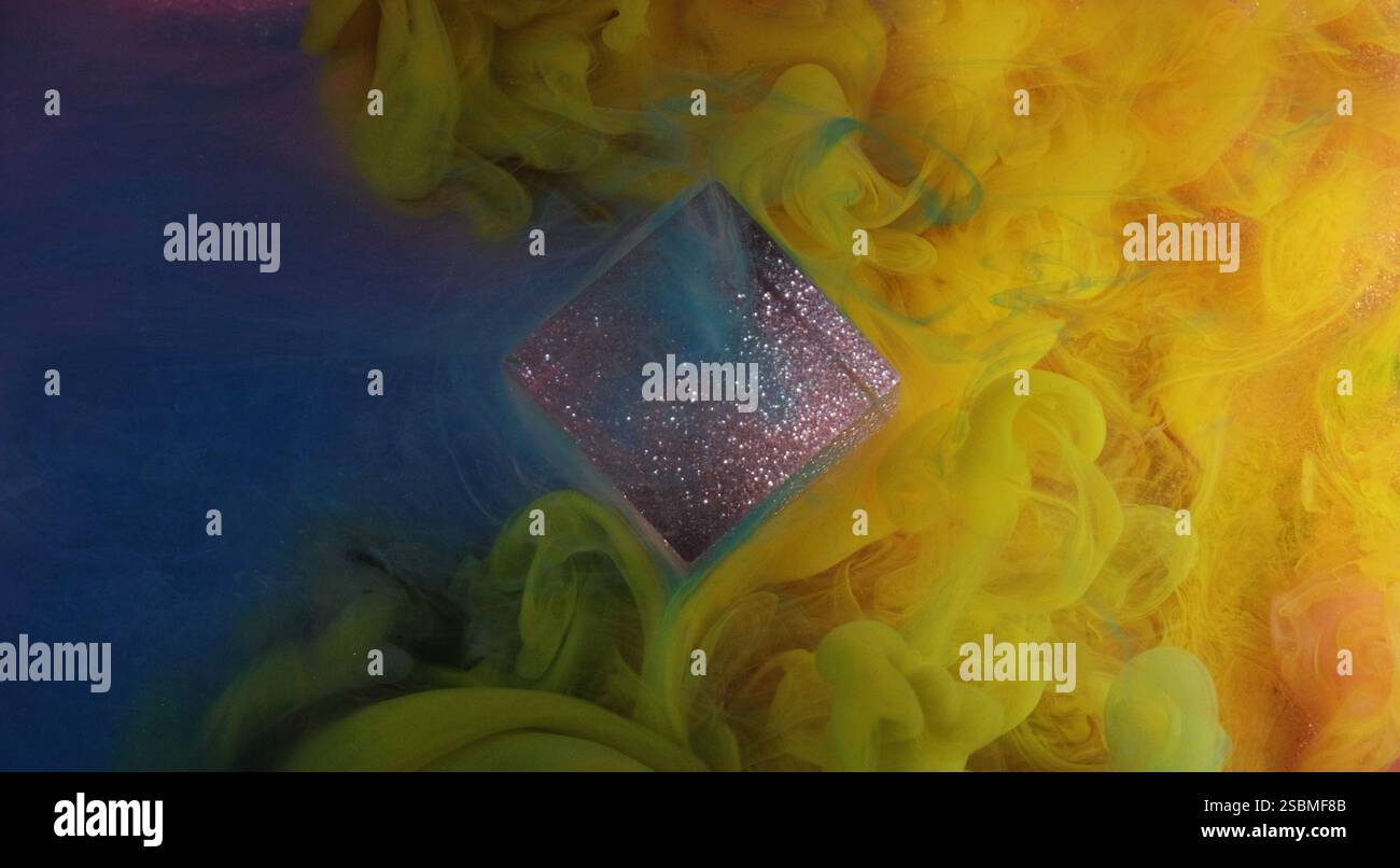 Mixing tone. Color spill splash. Bright yellow blue flow smoke glitter ...
