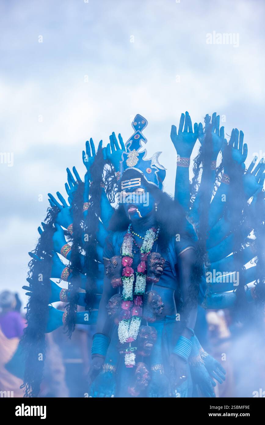 Kulasai, Portrait of indian hindu devotee with painted face and dressed ...