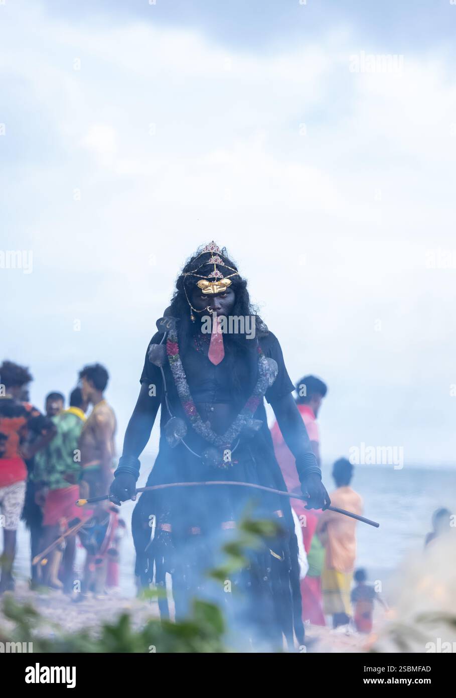 Kulasai, Portrait of indian hindu devotee with painted face and dressed ...