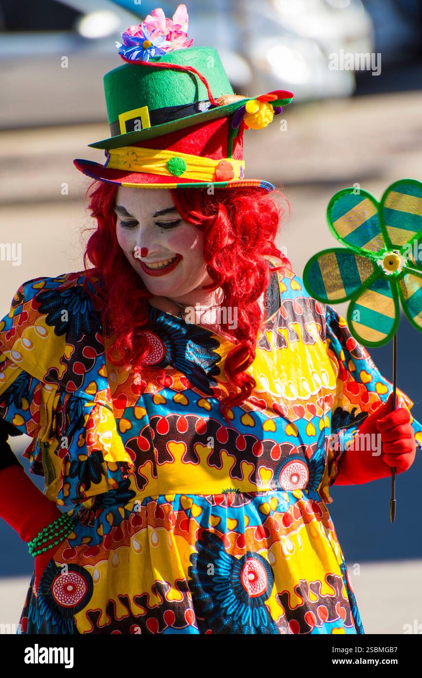 Colorful Clown in Fancy Costume Holding Green Shamrock Decoration Stock ...