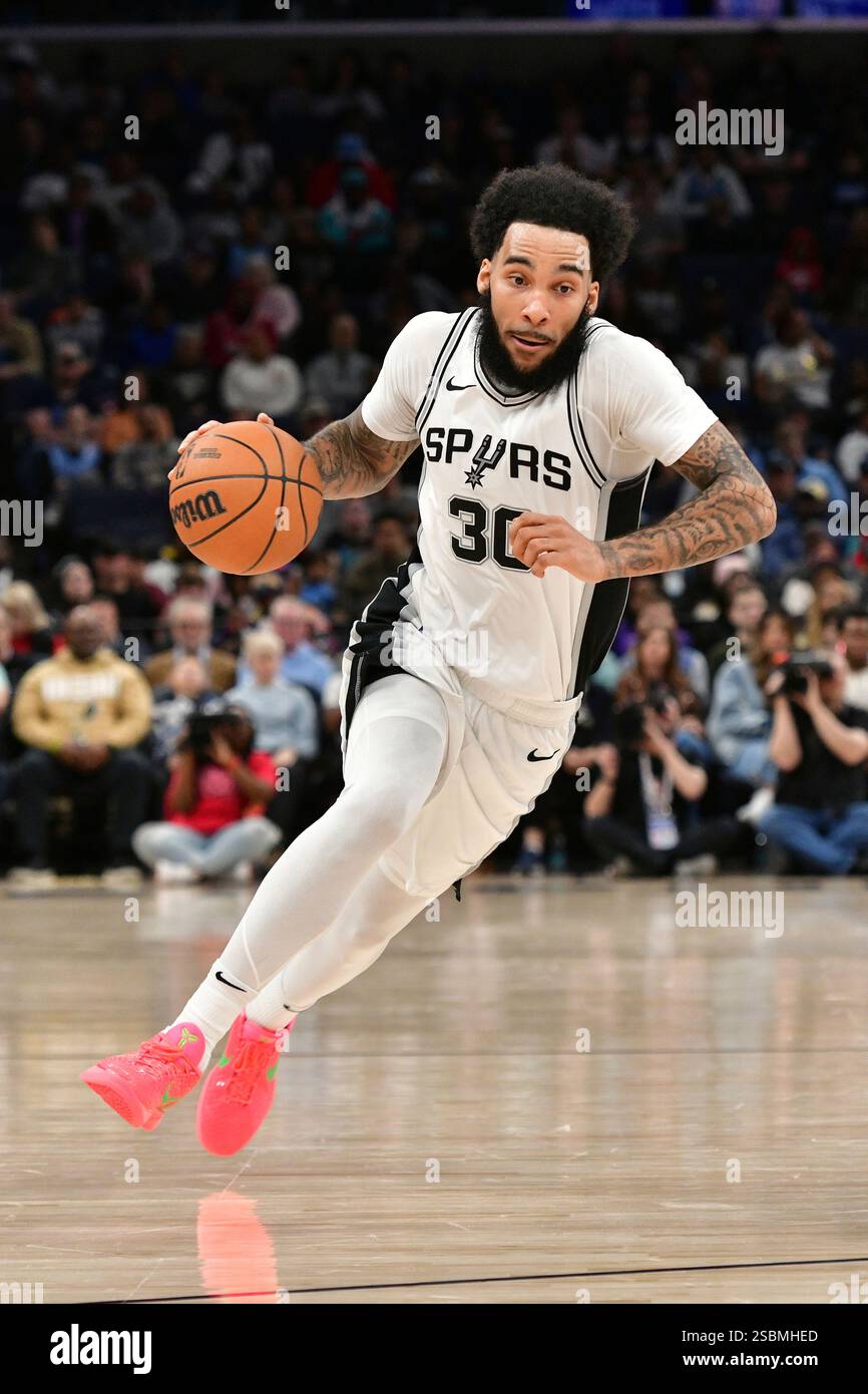 San Antonio Spurs forward Julian Champagnie (30) handles the ball in ...