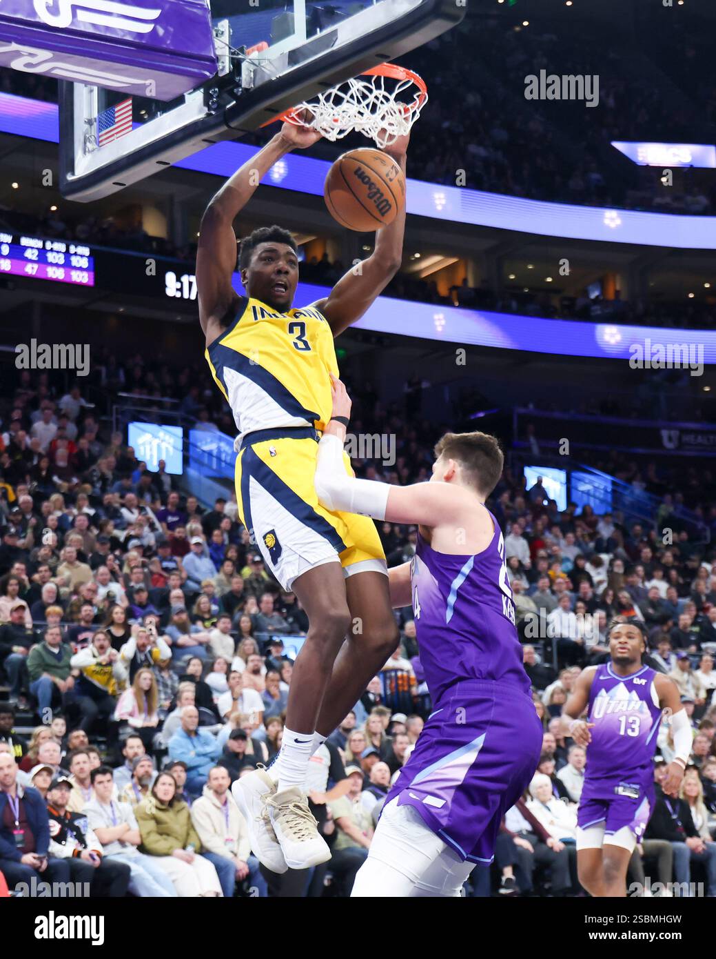 Indiana Pacers center Thomas Bryant (3) dunks against Utah Jazz forward ...