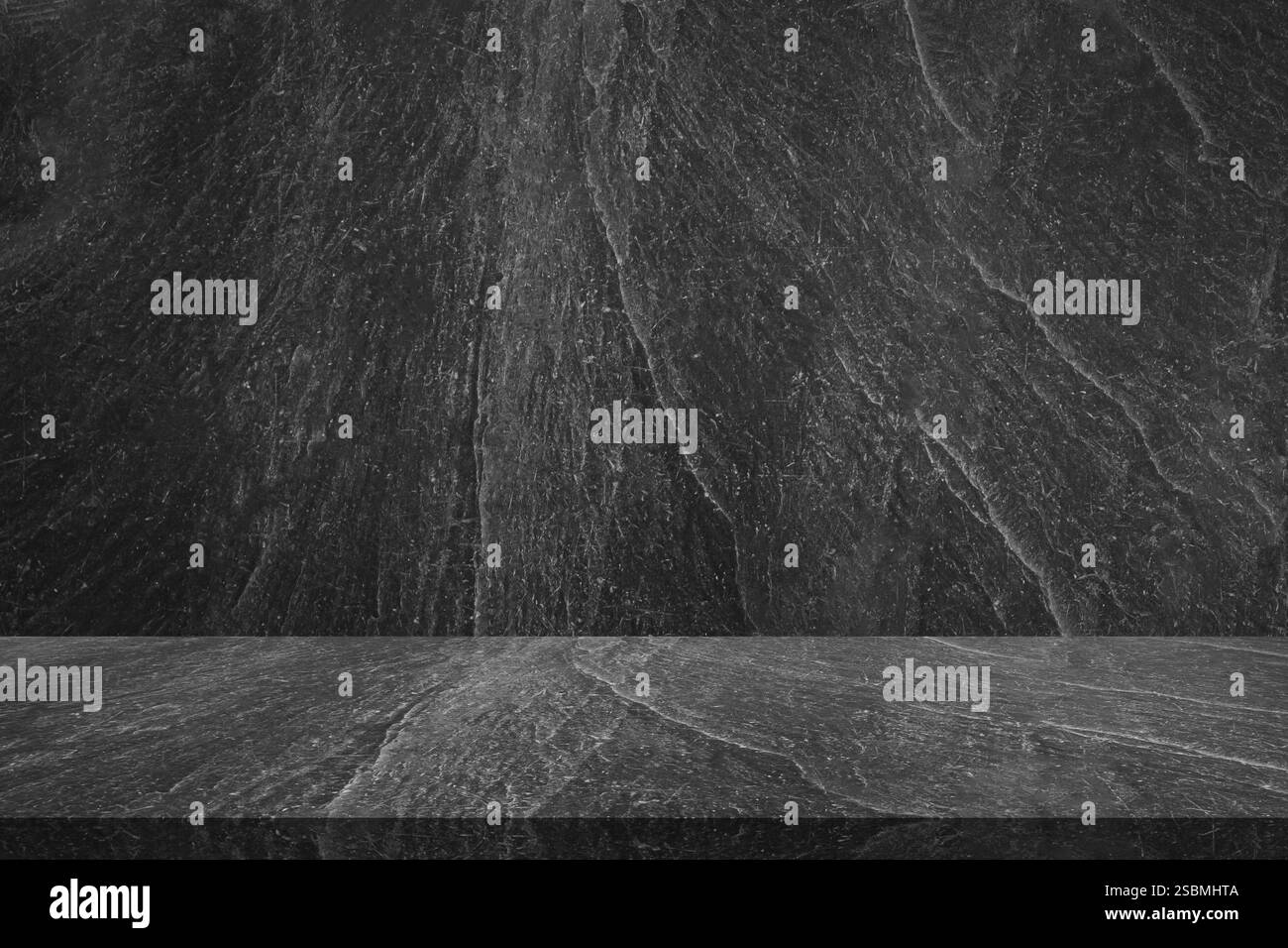 Empty black marble table top with black stone wall texture background ...