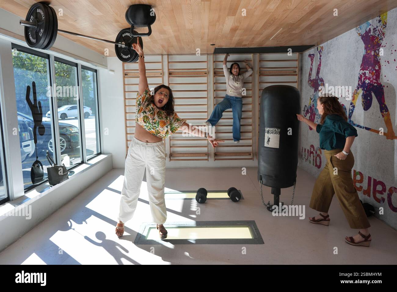 A group of friends pose for a picture that will be rotated upside down ...