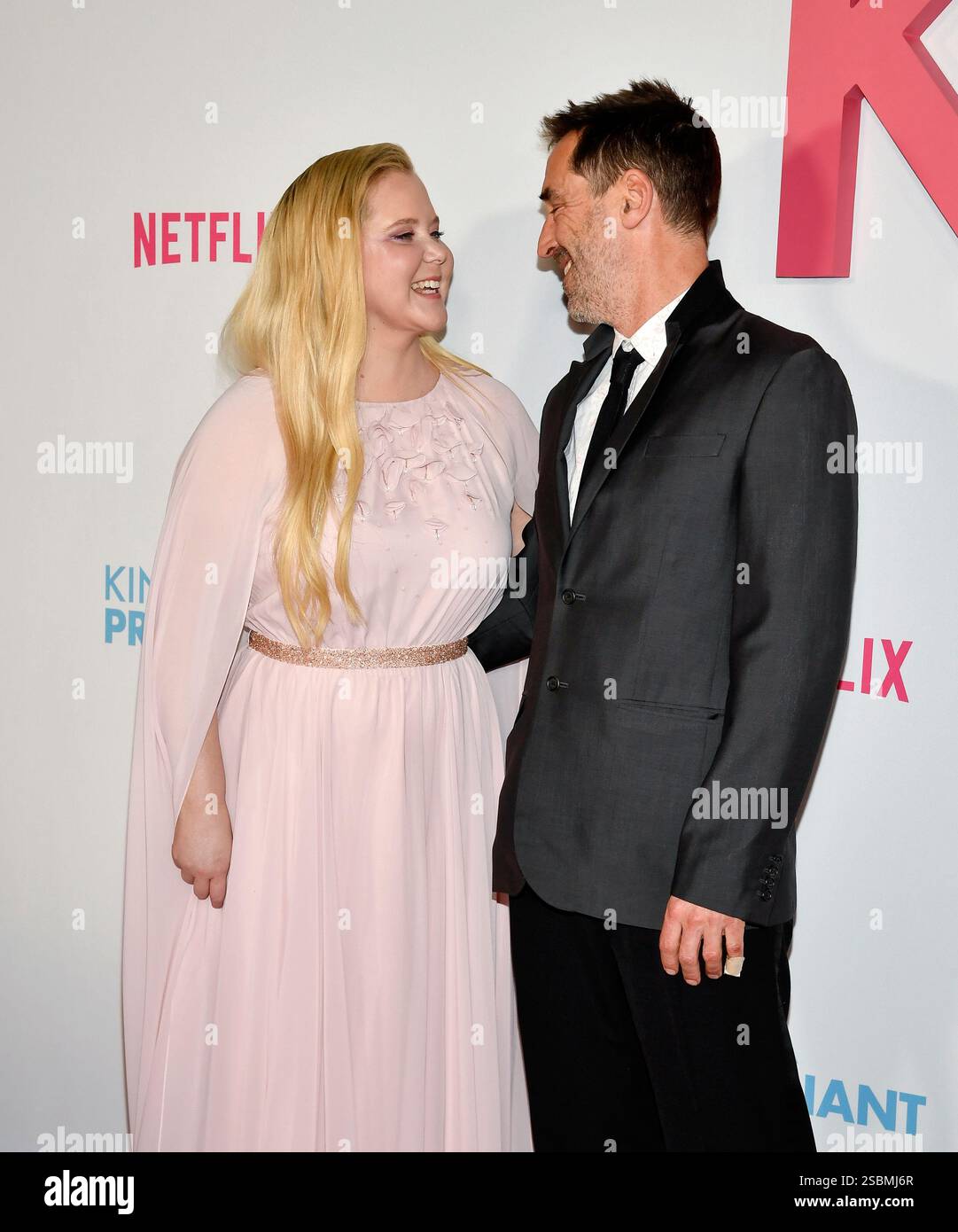 Amy Schumer, left, and husband Chris Fischer attend the premiere of ...