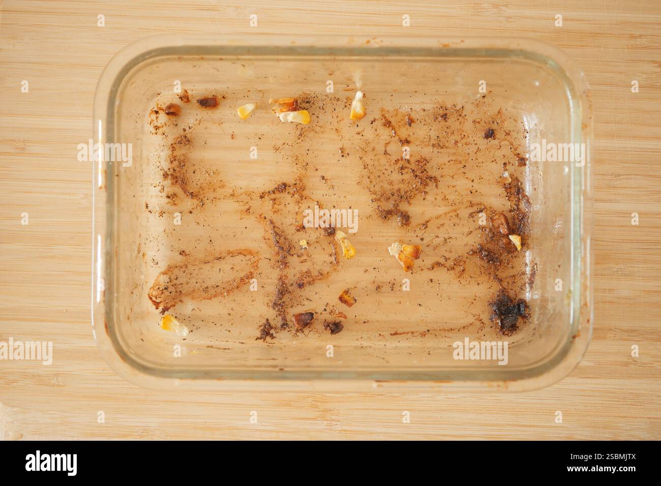 Empty dish shows meal remnants Stock Photo - Alamy