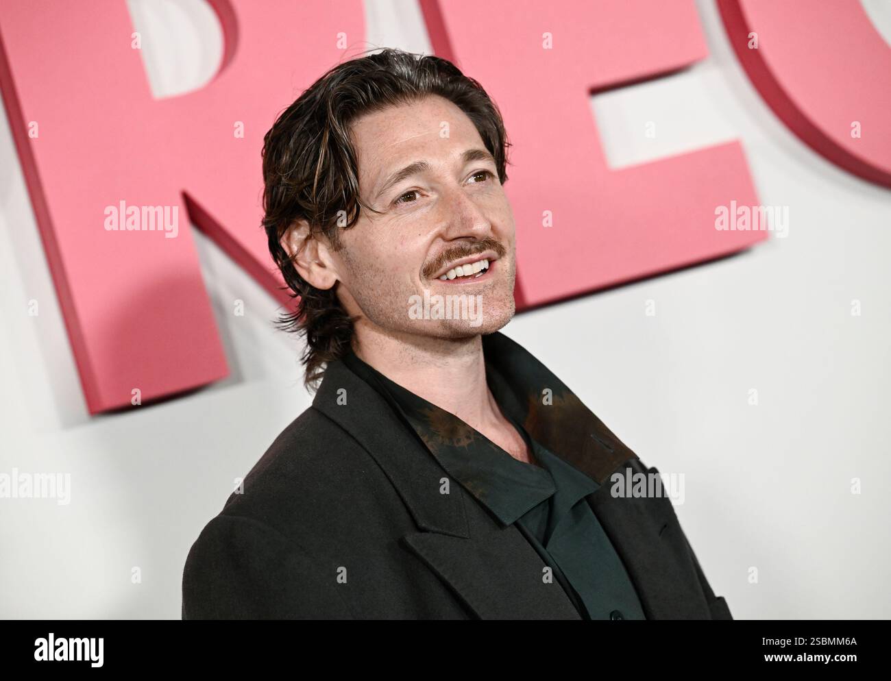 Lucas Neff attends the premiere of Netflix's "Kinda Pregnant" at The ...