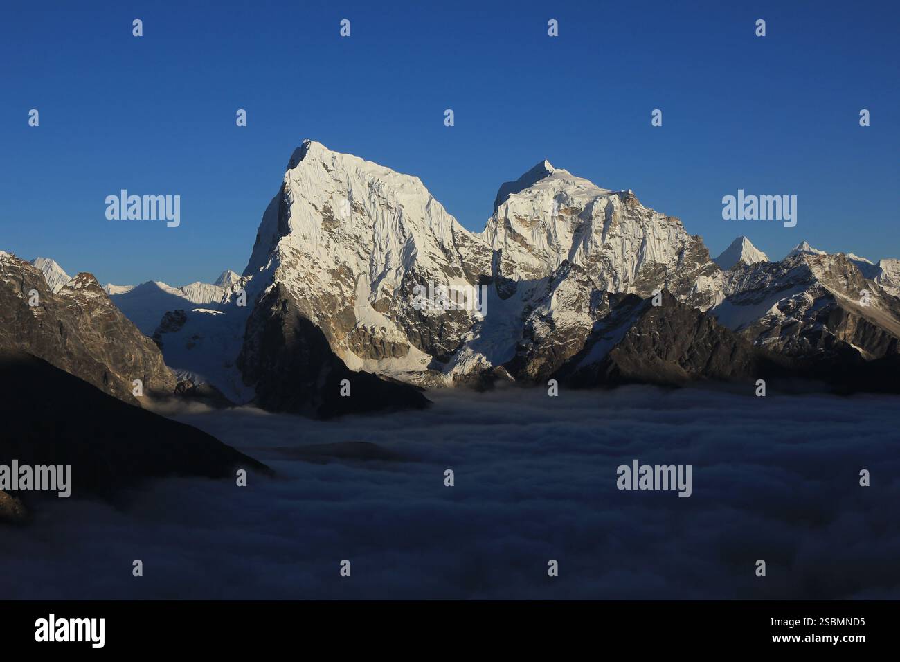 Majestic mountains Cholatse and Taboche, Nepal Stock Photo - Alamy