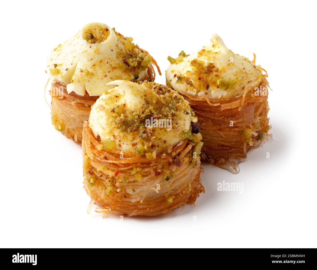 Delicious traditional dessert made with shredded pastry filled with ...