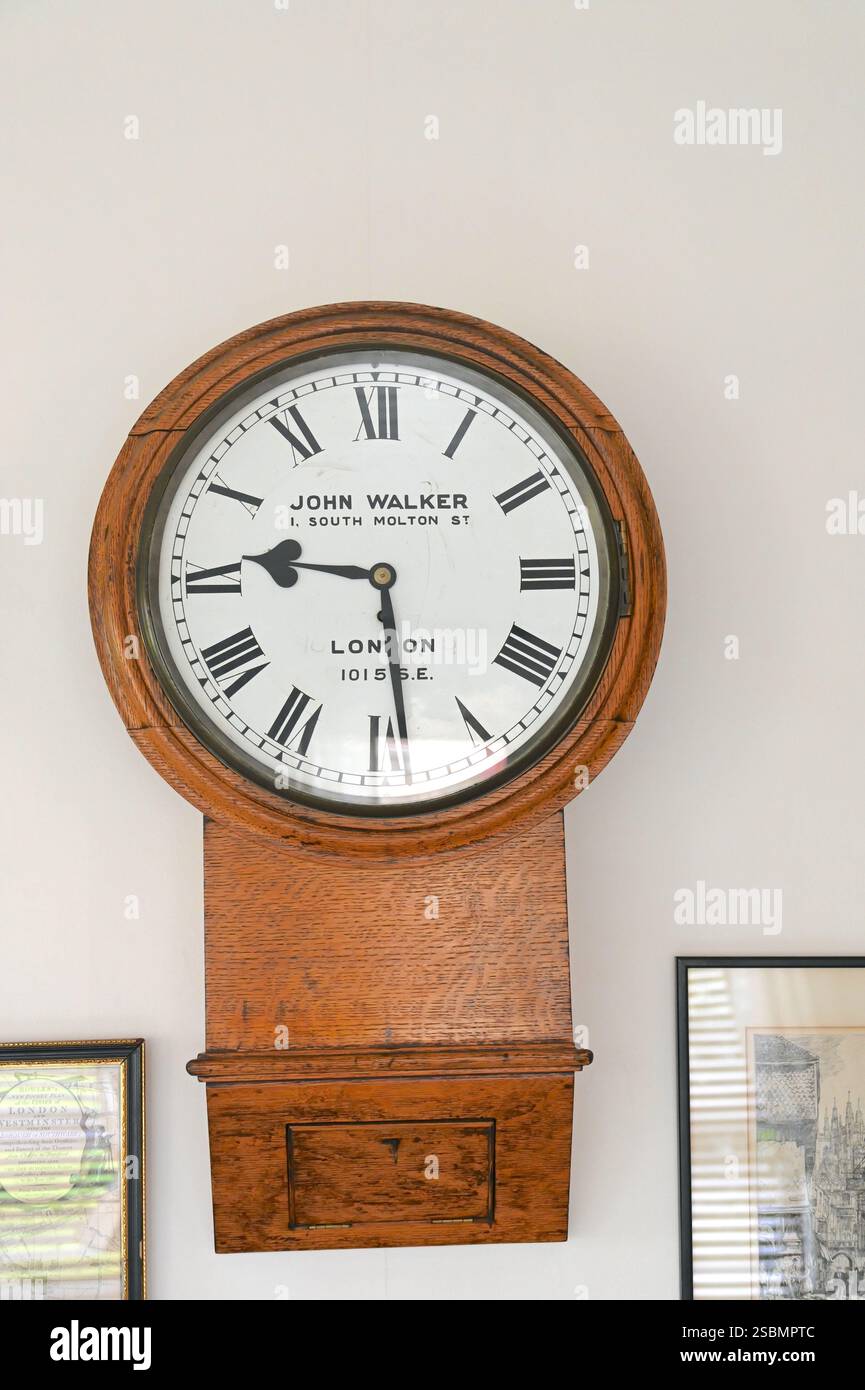 Vintage round clock London make John Walker on light background Stock ...