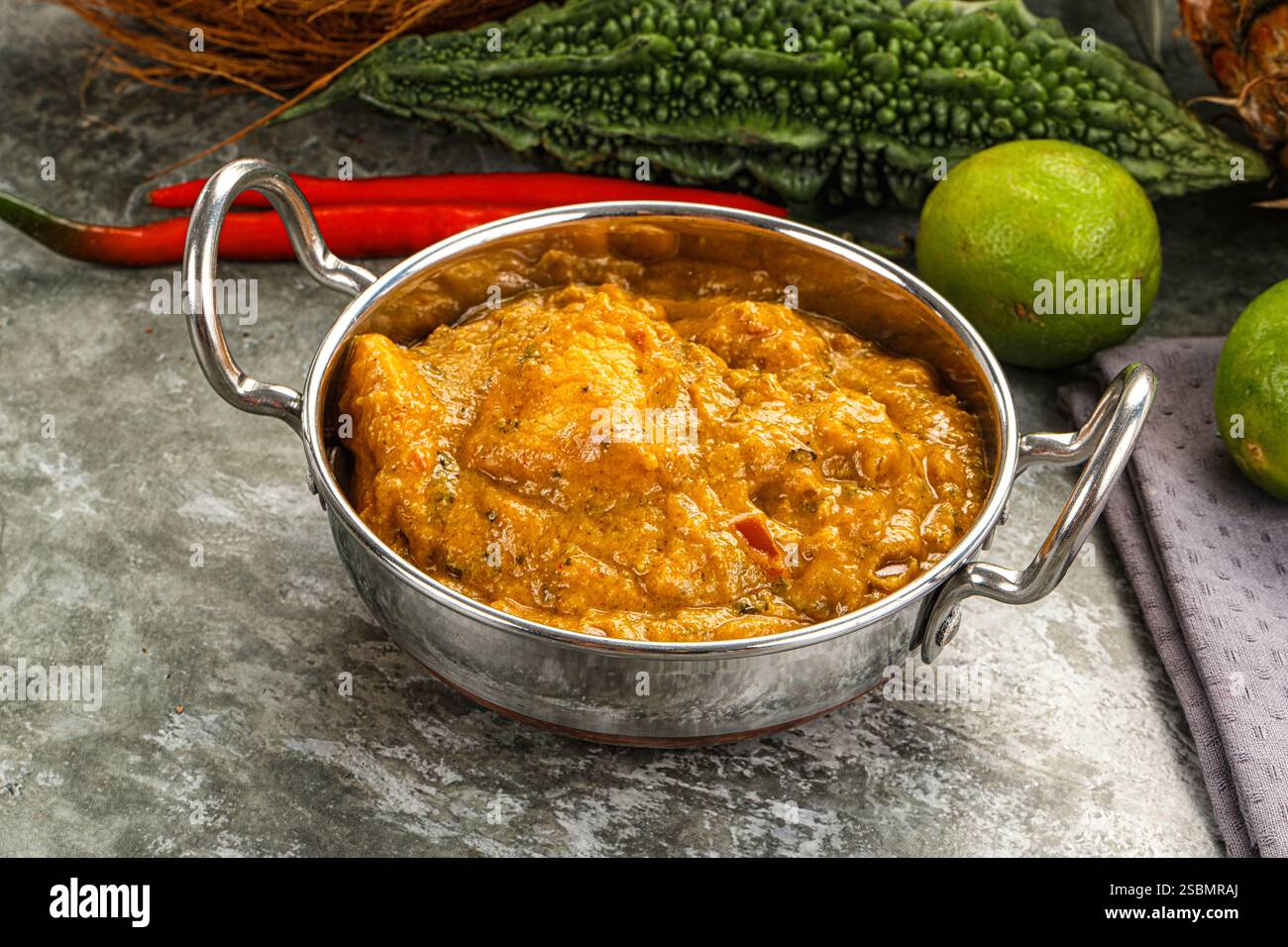 Indian cuisne - Chicken massala with sauce and spices Stock Photo - Alamy