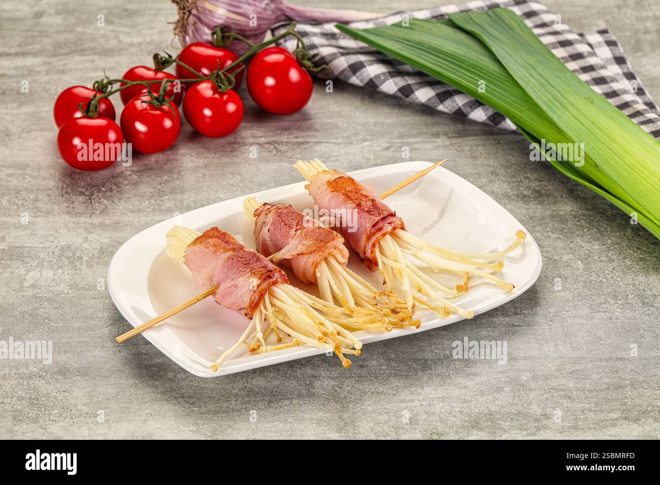 Grilled enoki mushroom with bacon roll wrap Stock Photo - Alamy