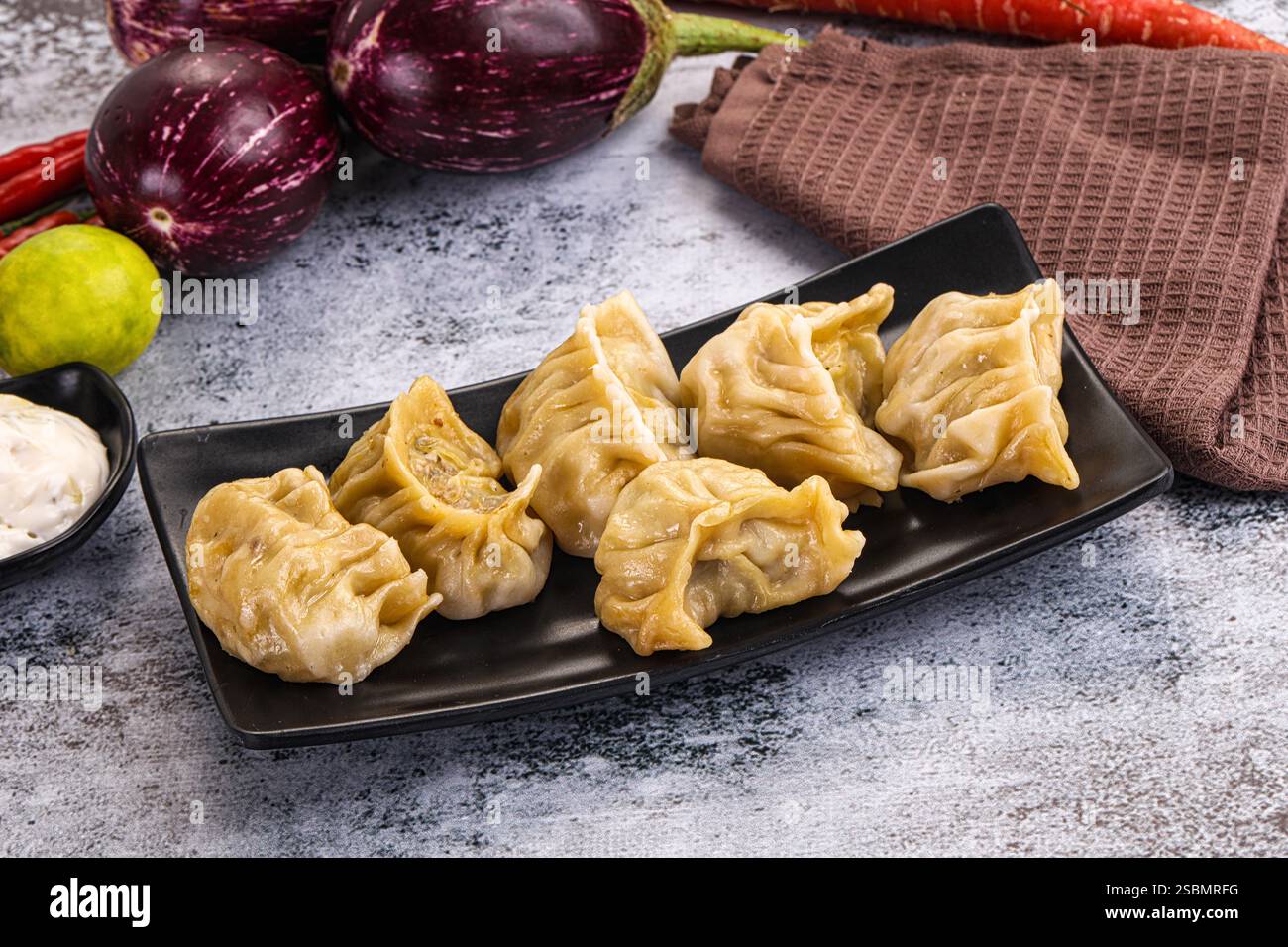 Steamed Nepali traditional Momo stuffed dumplings Stock Photo - Alamy