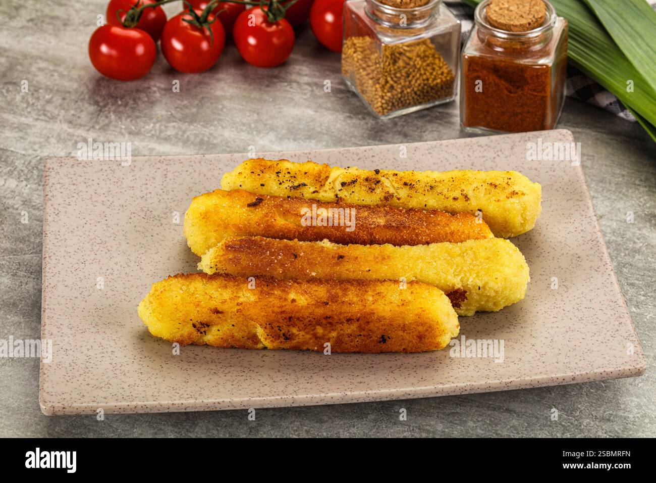 Crispy breaded mozarella cheese sticks appetizer Stock Photo - Alamy