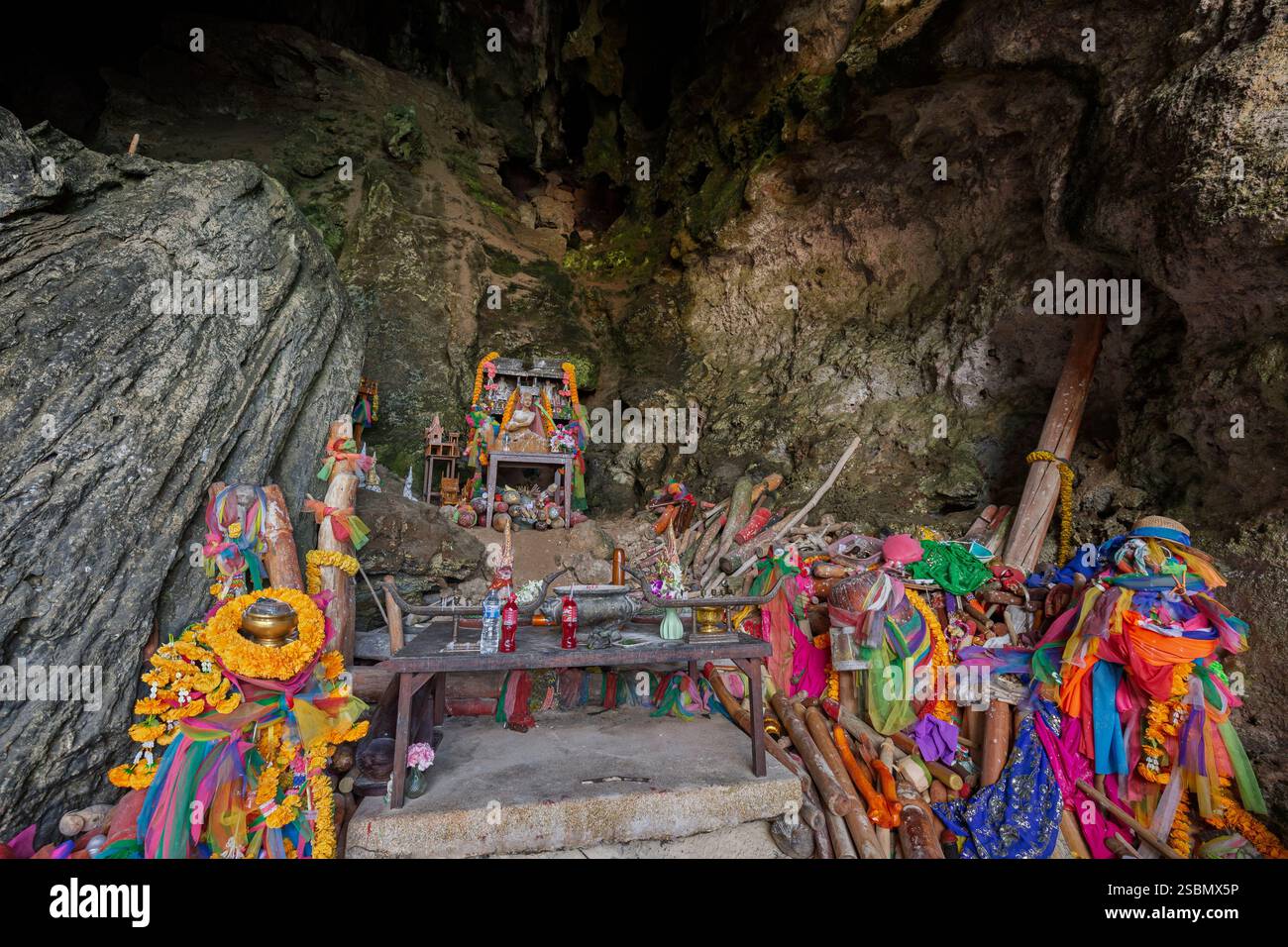 Many decorative wooden lingams (phallic symbols) as offerings at a ...