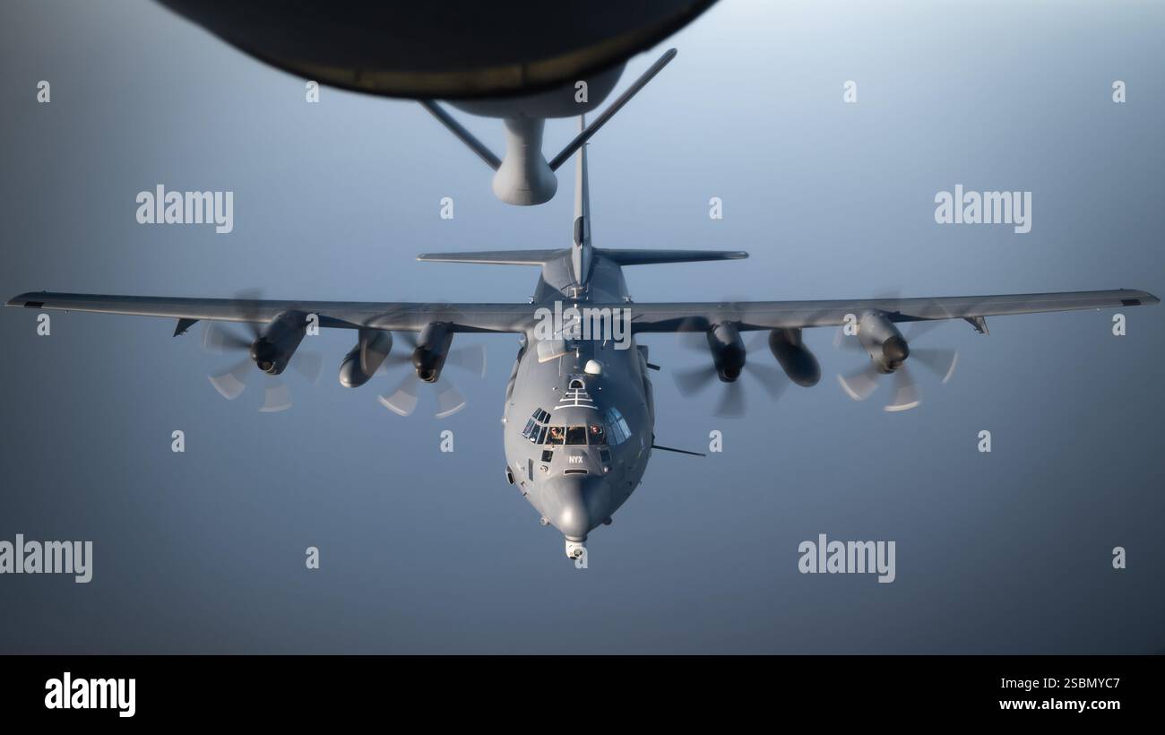 A U.S. Air Force AC-130J Ghostrider prepares to refuel from a KC-135 ...