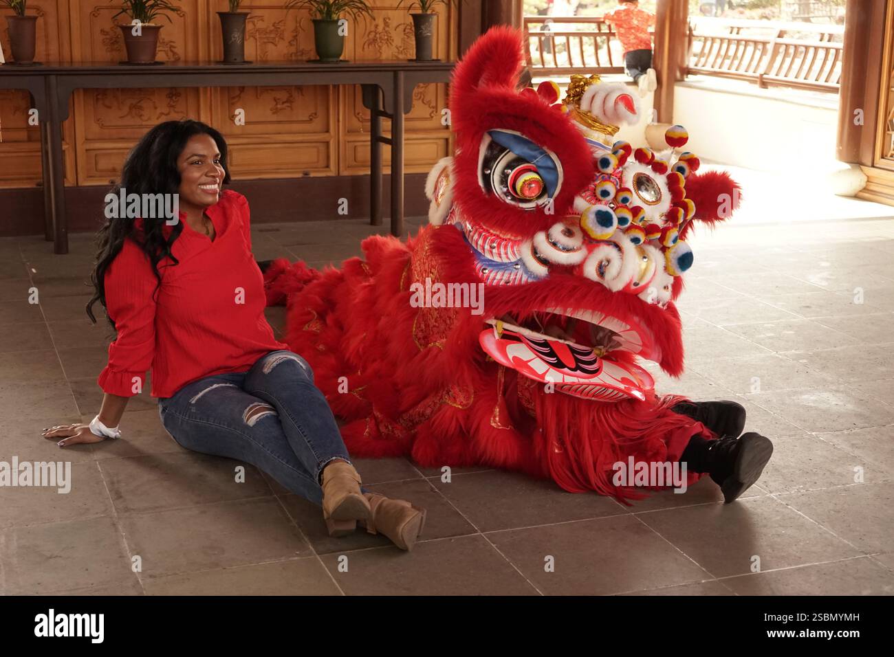 Los Angeles, USA. 1st Feb, 2025. A visitor takes photo with lion ...