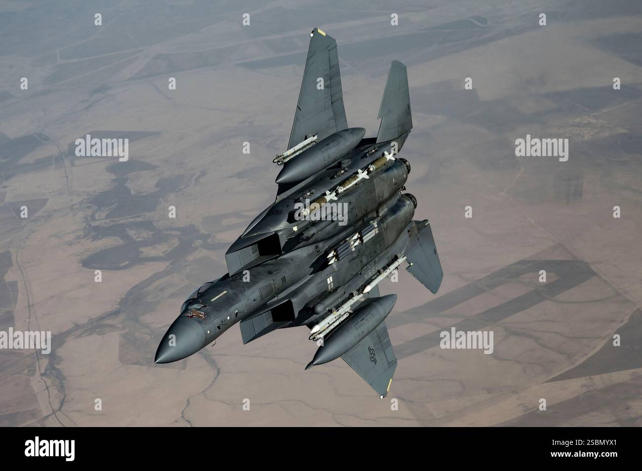 A U.S. Air Force F-15E Strike Eagle departs after being refueled over ...