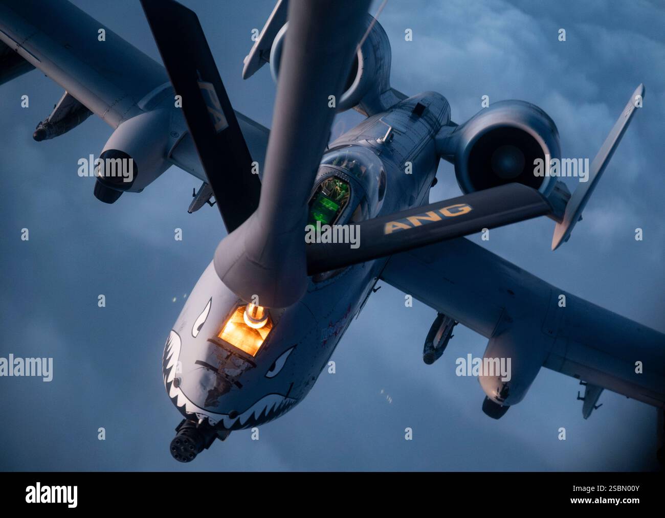 A U.S. Air Force A-10 Thunderbolt II is refueled over the U.S. Central Command area of ...