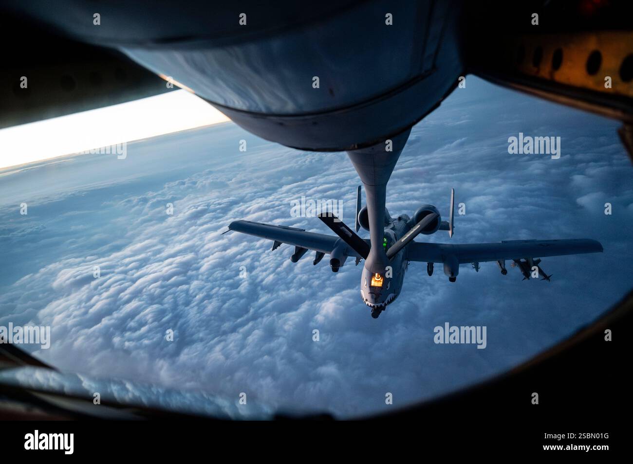 A U.S. Air Force A-10 Thunderbolt II is refueled over the U.S. Central Command area of ...