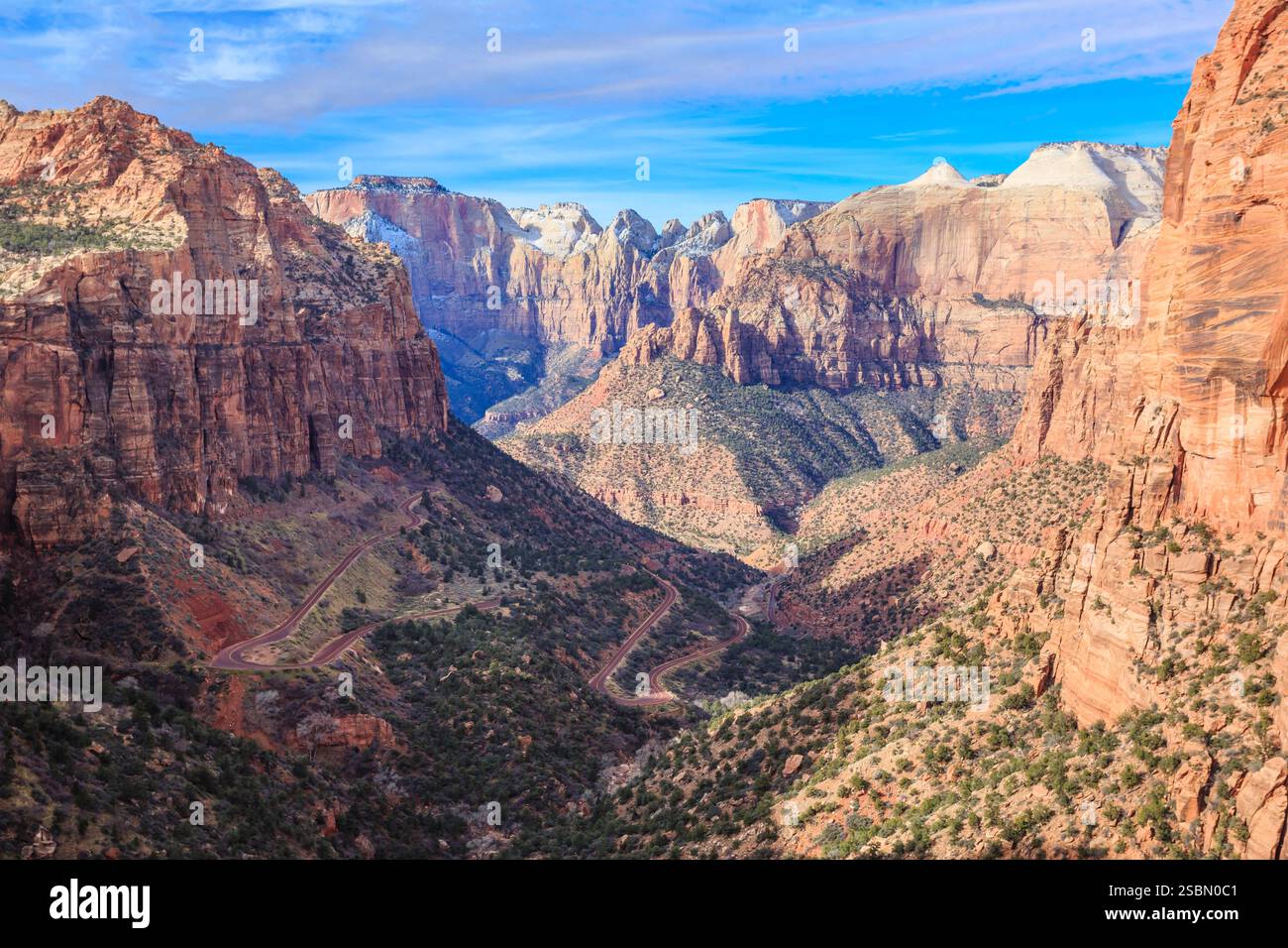 Mountain range with a valley in between. The valley is filled with ...