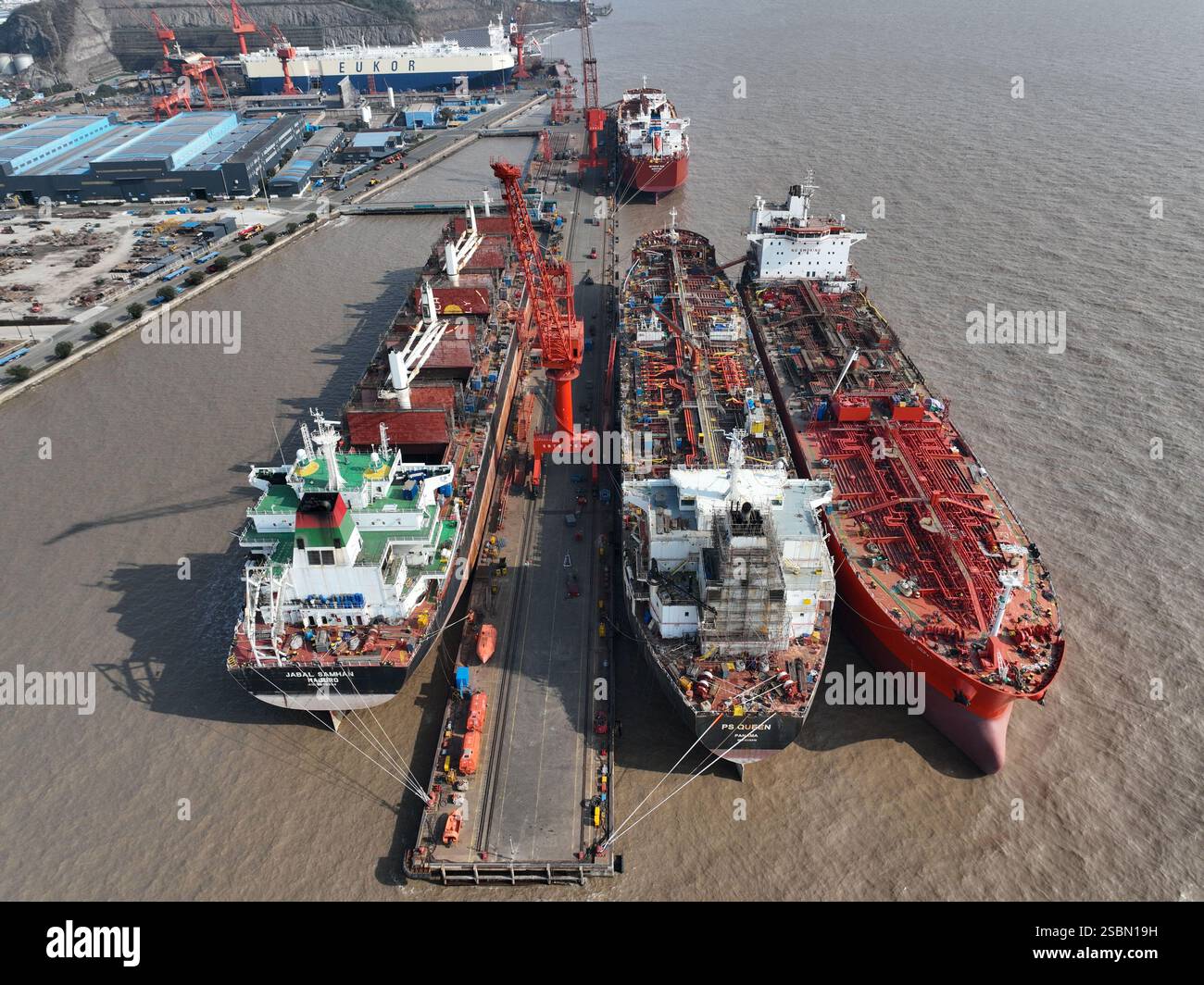 ZHOUSHAN, CHINA - FEBRUARY 4, 2025 - Workers at a ship maintenance ...
