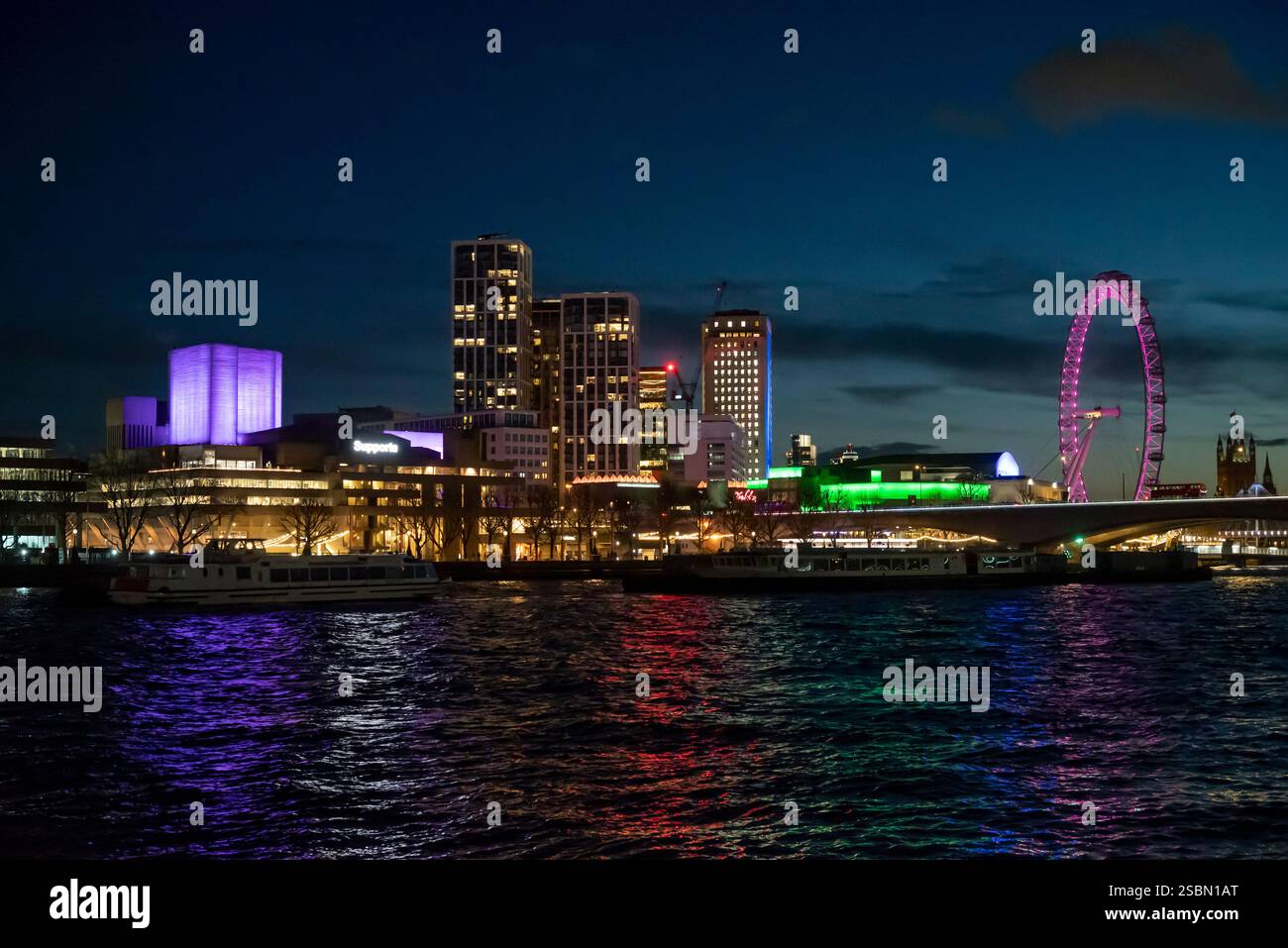 View of the River Thames, Royal Festival Hall and London Eye, at night ...