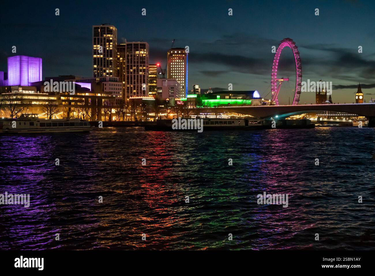 View of the River Thames, Royal Festival Hall and London Eye, at night ...