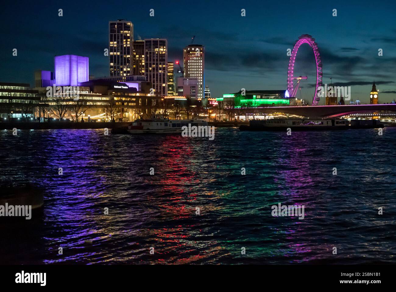 View of the River Thames, Royal Festival Hall and London Eye, at night ...